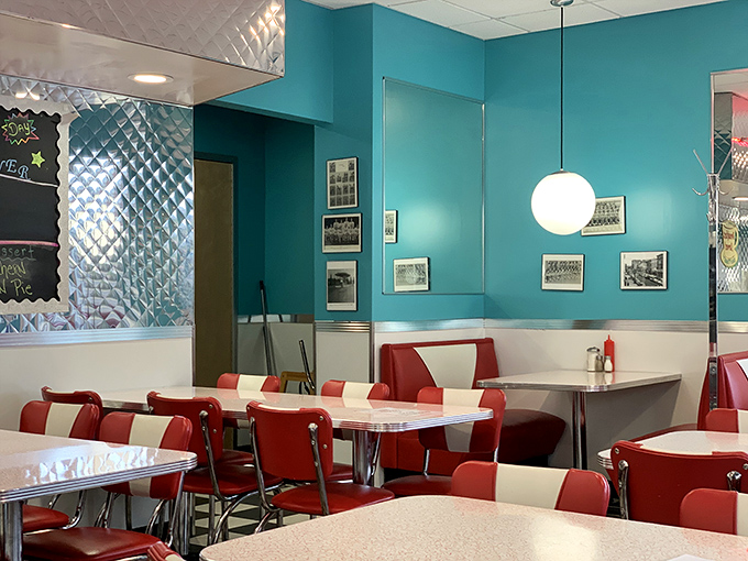 Step inside and time stands still&mdash;red vinyl stools, curved ceiling, and the promise of comfort food that makes Monday mornings bearable.