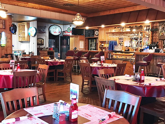 Inside, wooden paneling and red tablecloths create that perfect "come as you are" atmosphere where memorable meals and conversations unfold.