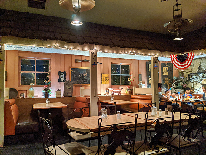 Inside, string lights and Western decor create that perfect "fancy night out in 1975" ambiance that somehow feels more authentic than any modern steakhouse.