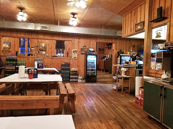 Wooden walls and picnic tables create the perfect rustic backdrop for the serious business of barbecue consumption.