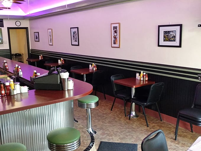 Classic diner aesthetics done right&mdash;red tables, black booths, and mint green counter stools that have cradled countless breakfast enthusiasts' behinds since opening day.