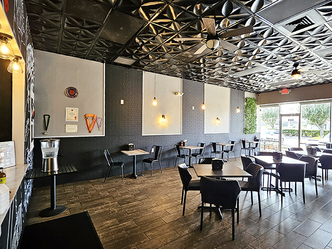 Classic red vinyl booths and checkerboard floors set the stage for breakfast theater where every plate gets a standing ovation.