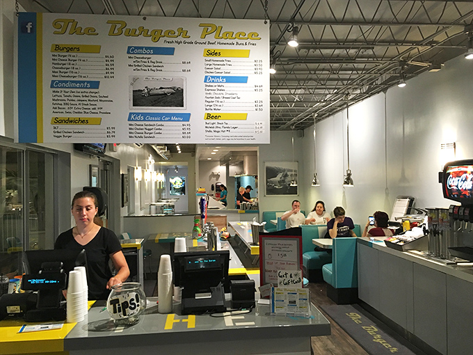 Where burger magic happens! The bright yellow and turquoise color scheme feels like a cheerful diner from a more delicious era.
