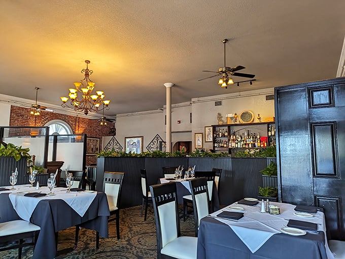 White tablecloths, elegant lighting, and exposed brick walls create the kind of atmosphere where memories are made and calories don't count.