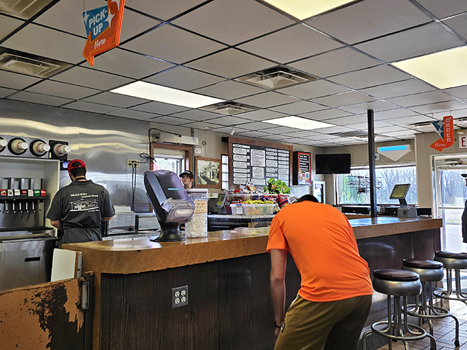 Step inside where drop ceilings and honest hospitality create the perfect backdrop for culinary magic.