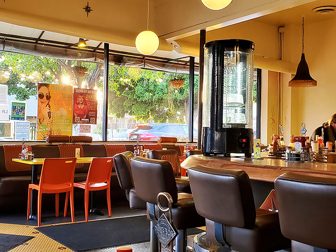 Step inside and it's like The Jetsons decided to open a diner, complete with globe lights and groovy vibes.