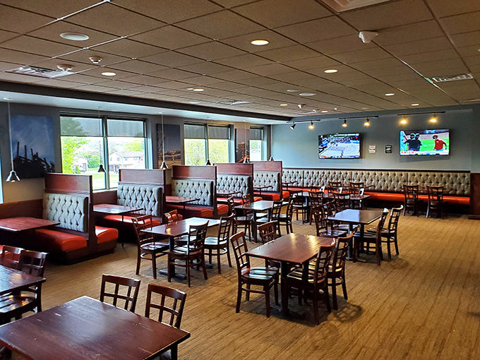 Spacious booths and warm lighting create the perfect setting where morning conversations flow as smoothly as the coffee refills.