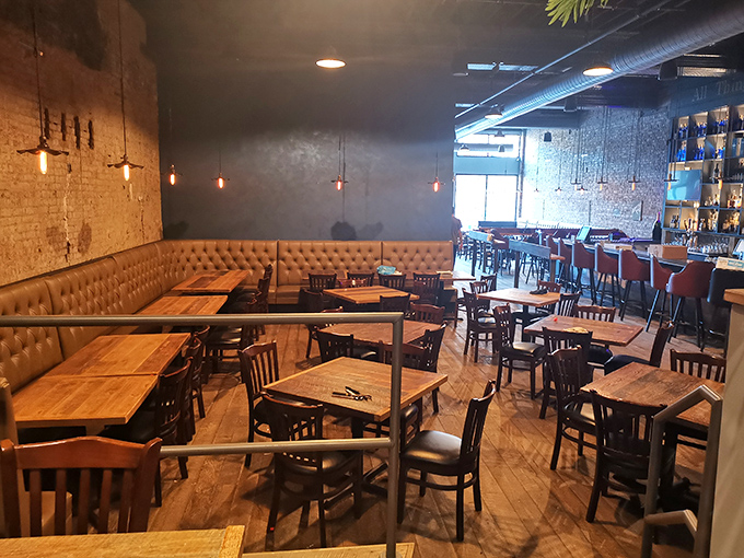 Exposed brick walls and leather banquettes create that perfect "I've discovered something special" vibe that makes you want to settle in for the evening.