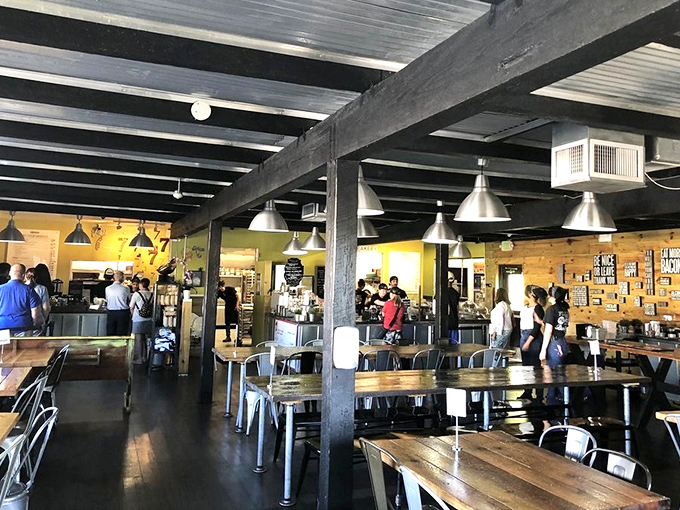 Industrial chic meets Southern comfort in this buzzing breakfast paradise where strangers become friends over shared plates.