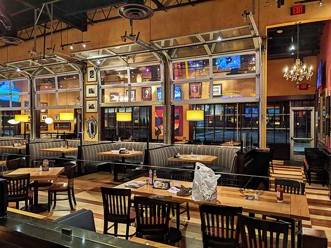 Industrial-chic meets cozy comfort in BJ's interior, where garage doors transform the space into an indoor-outdoor oasis during Ohio's kinder weather months.