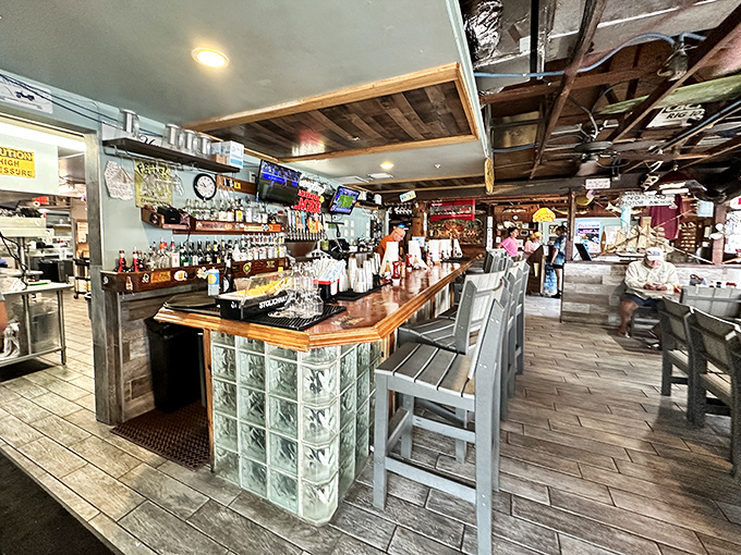 Classic black and white checkerboard floors set the unpretentious stage for culinary magic. No designer needed when the food does the talking.
