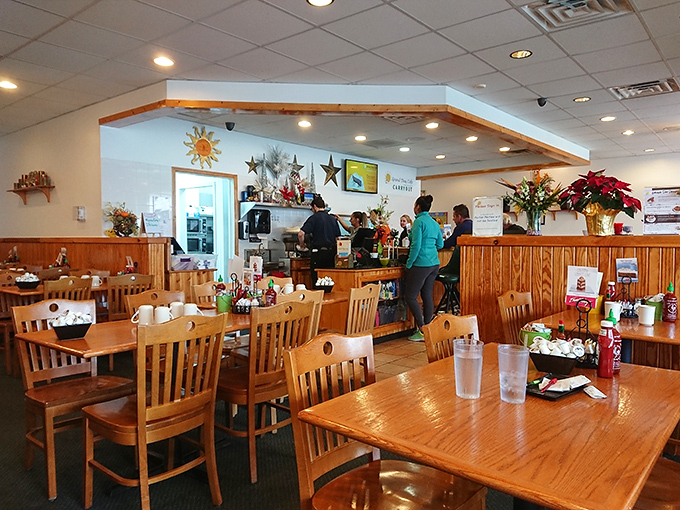 Wooden paneling and sun motifs create that classic diner warmth&mdash;the kind of place where coffee refills arrive before you even realize you need one.