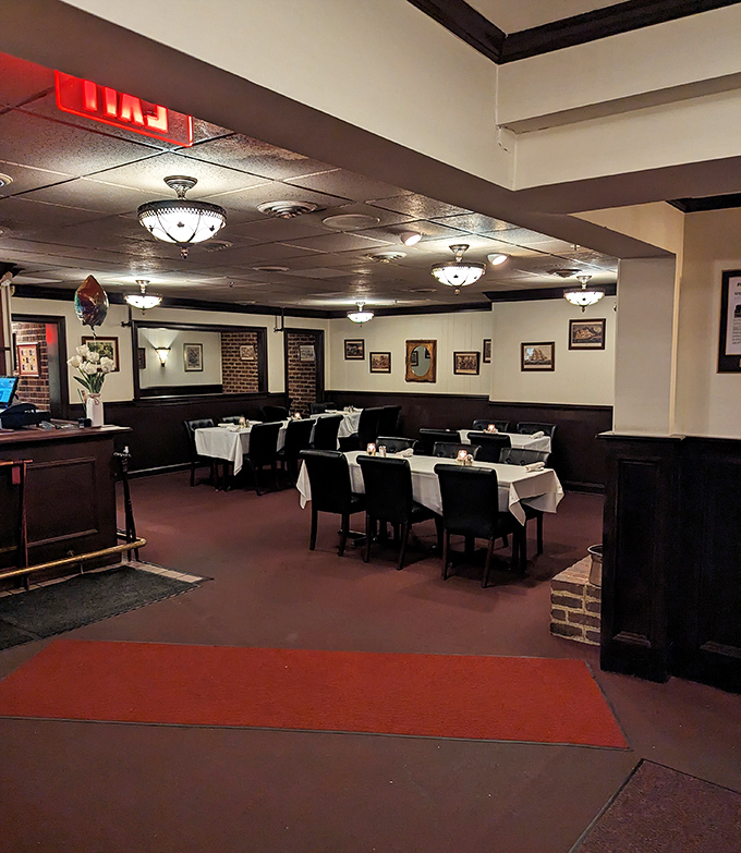 Classic steakhouse elegance awaits inside &ndash; white tablecloths, dark wood paneling, and lighting dim enough to make everyone look like movie stars.