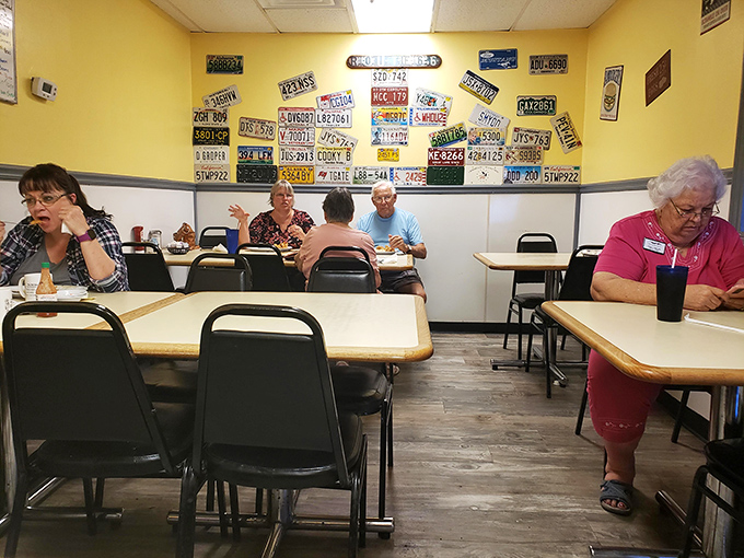 License plates from across America line the walls – silent testimonials that people will cross state lines for biscuits this good.