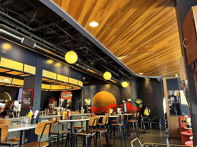 Inside, wooden ceiling panels meet space-age lighting while that magnificent Mercury mural watches over hungry earthlings at the command center counter.
