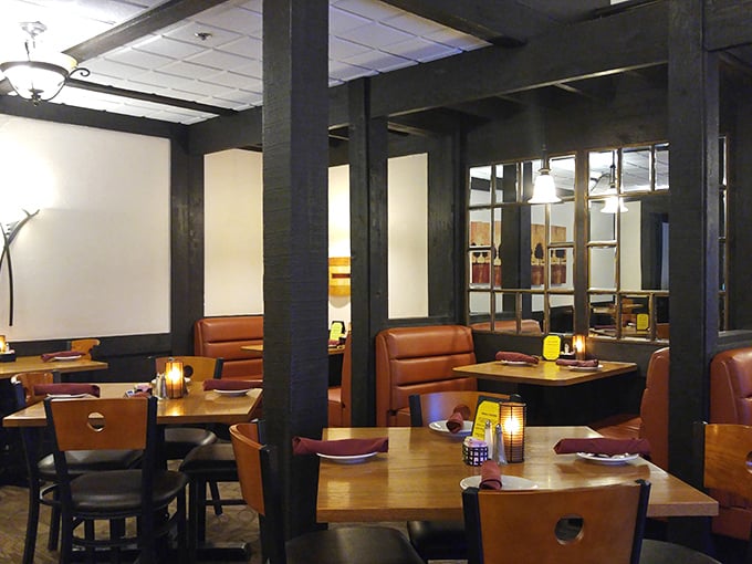 Cozy leather booths and warm wooden accents create intimate dining spaces where conversations flow as freely as the wine. Dinner and a show—the show being your dinner!
