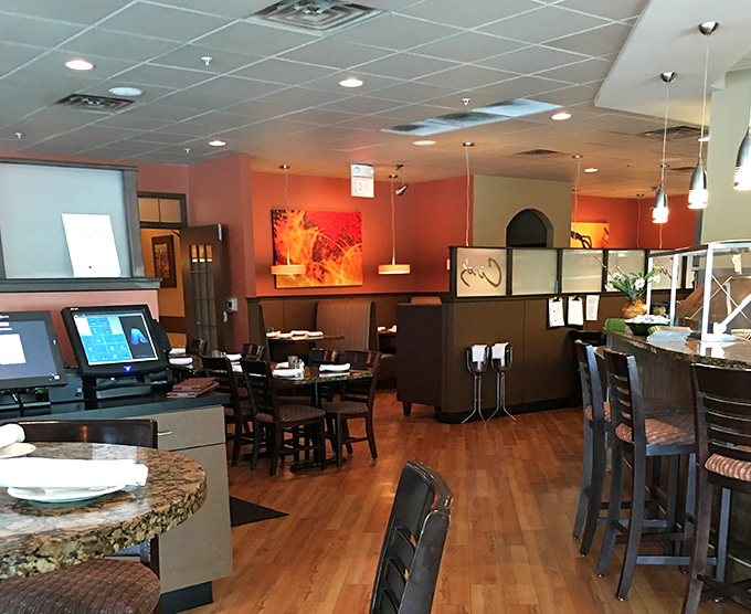 Step inside where warm lighting and thoughtful design create the perfect backdrop for memorable meals and frozen masterpieces.