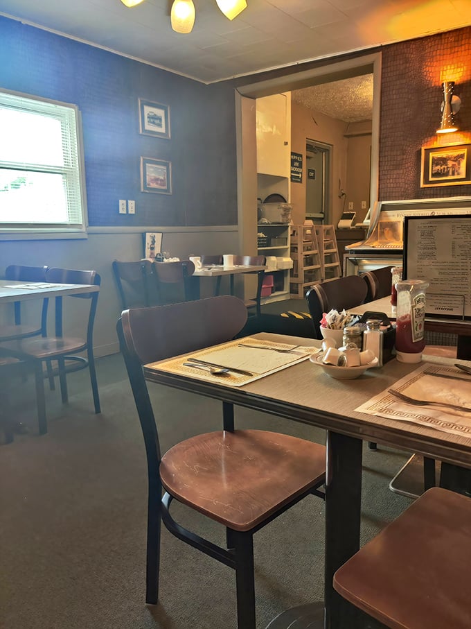 Blue walls, wooden chairs, and zero pretension&mdash;Fred's interior feels like stepping into a time machine where comfort trumps trendiness every single time.