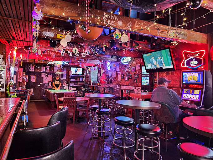 Step inside and time stands still. Christmas lights twinkle year-round, neon signs glow, and conversations flow as freely as the beer.