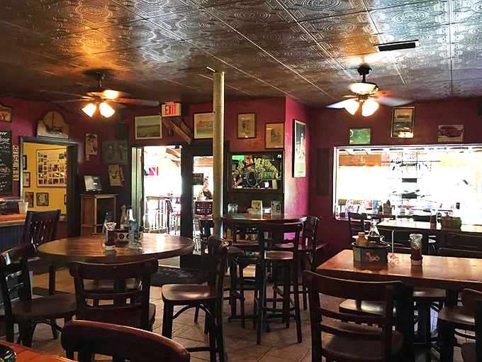 Inside, the burgundy walls and pressed tin ceiling create that perfect "I've discovered something special" vibe that makes you want to become a regular by dessert.