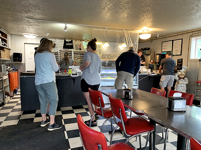 Inside Joe's, the classic black and white floors and red chairs create a timeless backdrop for the main event&mdash;donuts that make grown adults giggle with anticipation.