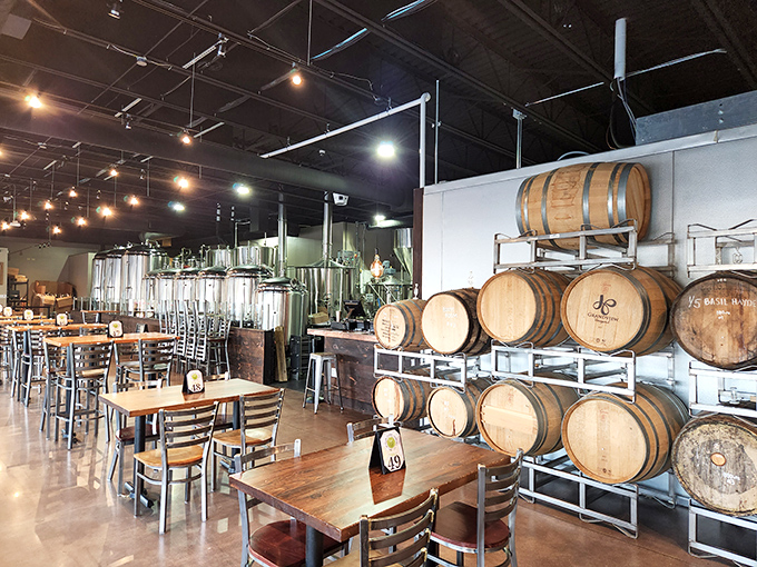 Industrial-chic meets beer barrel elegance. The brewing tanks aren't just for show&mdash;they're the beating heart of this flavor laboratory.