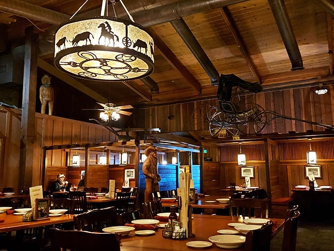 Step inside and you're transported to the Old West, where antler chandeliers cast a warm glow over wooden booths that have witnessed countless carnivorous celebrations.