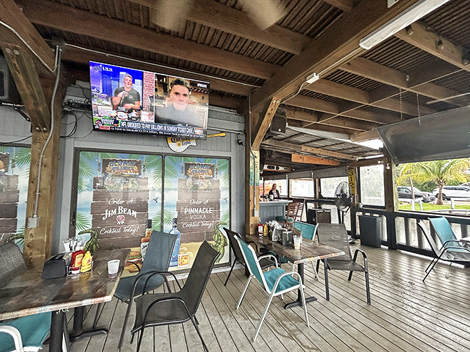 Rustic wooden beams, turquoise chairs, and water views create that perfect "I've discovered something special" feeling that makes vacation stories worth telling for years. 