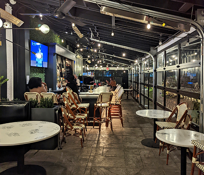 Step inside and time slows down &ndash; the bar area's warm lighting and bistro chairs invite you to linger over cocktails before the main event.
