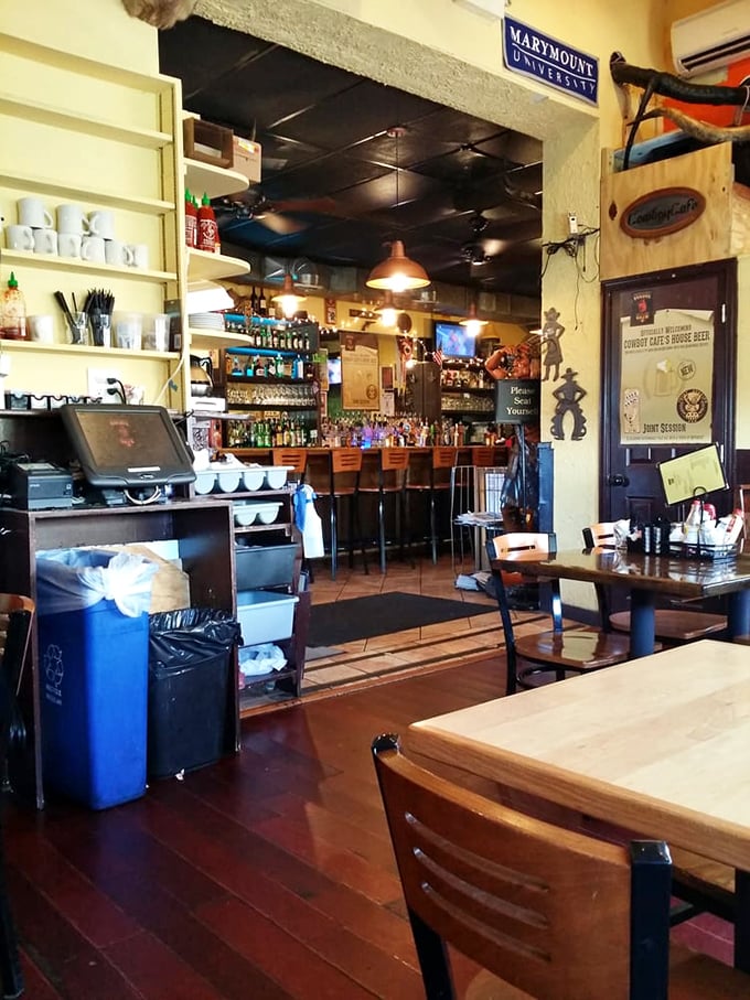 Classic western meets neighborhood charm inside Cowboy Cafe. The well-stocked bar promises good times while cowboy memorabilia watches over hungry patrons.