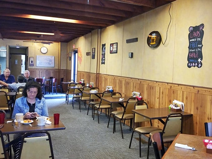 Simple wooden wainscoting and no-nonsense furnishings create the perfect backdrop for culinary magic. This isn't Instagram bait—it's genuine Michigan comfort.