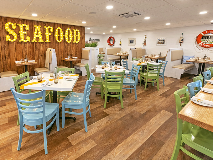 Step inside and the glowing "SEAFOOD" sign leaves no doubt about the mission here&mdash;those colorful chairs aren't just cheerful, they're waiting for your seafood revelation.