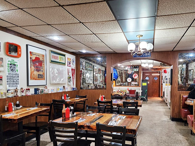 Wood-paneled walls lined with local memorabilia create the perfect atmosphere for serious scrapple appreciation and neighborhood storytelling.