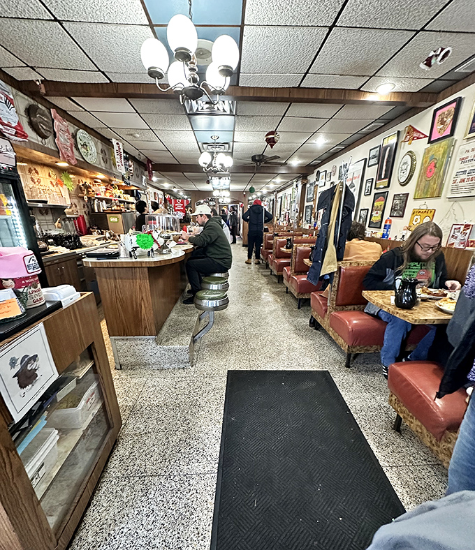 Narrow, nostalgic, and absolutely perfect—Sulimay's interior feels like a time capsule where calories don't count and conversations flow as freely as the coffee.