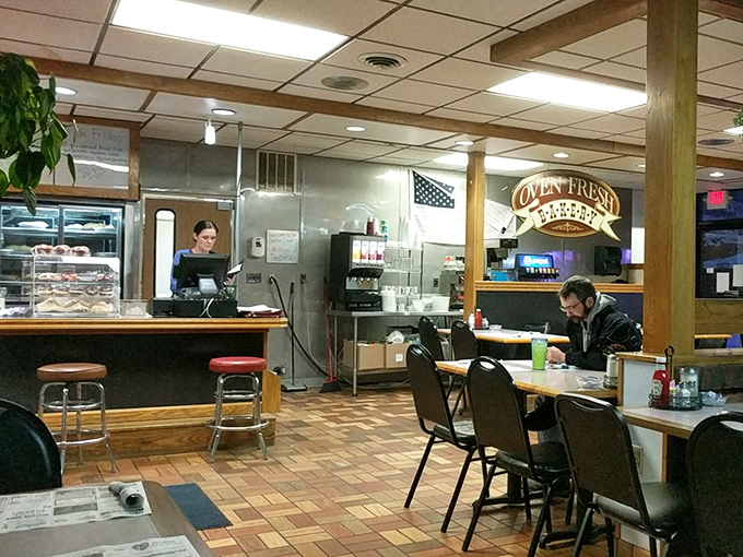 Classic diner ambiance that whispers, "Sit a spell." Wood paneling and counter seating&mdash;where strangers become friends over coffee refills.