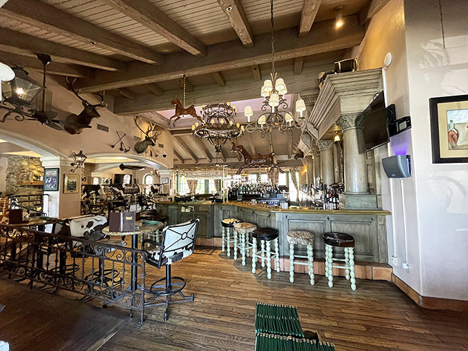 Where rustic meets refined: exposed beams, mounted trophies, and a bar that beckons weary travelers to pause and stay awhile. Cowboy chic at its finest.