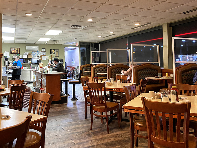 Classic diner comfort with a side of nostalgia. Those wooden chairs have supported more happy eaters than a Weight Watchers reunion.