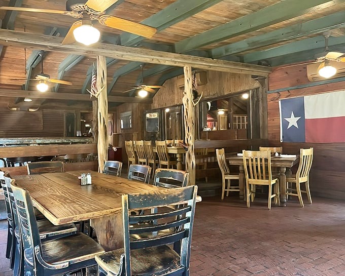 Inside, rustic wooden beams and the Texas flag create an atmosphere that whispers, "Relax, partner&mdash;you're about to have one of the best meals of your life."