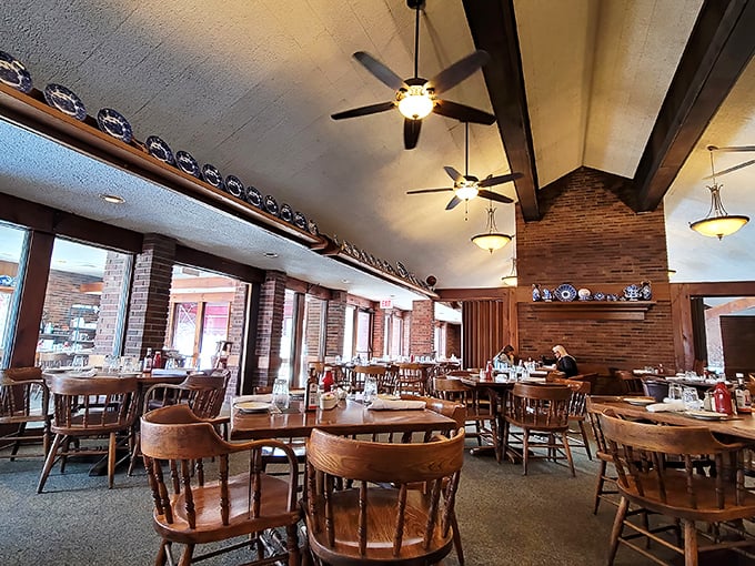 Wooden captain's chairs and vaulted ceilings create the perfect backdrop for serious meat consumption. This isn't dinner theater—it's dinner as theater.