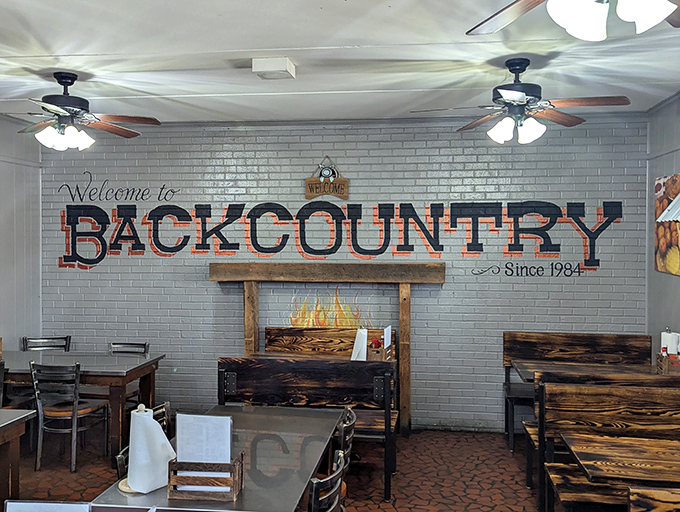 The welcome sign says it all – you've arrived at barbecue nirvana, where rustic wooden tables have witnessed countless "this is the best I've ever had" moments.