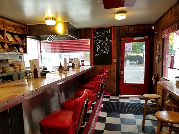 Step inside and time stands still. Red vinyl stools, checkered floors, and wood paneling create the diner trifecta of nostalgic perfection.