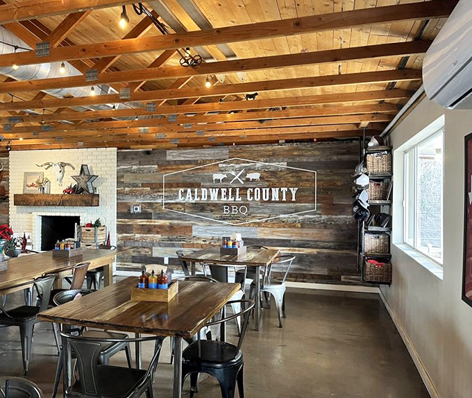 Exposed wooden beams and reclaimed wood walls create the perfect rustic backdrop for the serious business of barbecue appreciation.