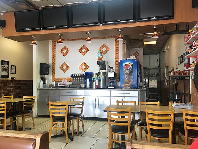 Inside, the cozy dining area feels like a potato-themed living room where comfort trumps pretension and the diamond-shaped wall accents add just enough whimsy. 