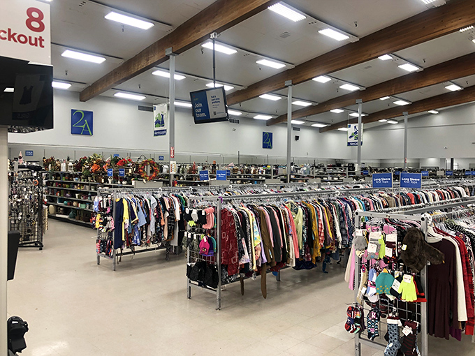 Racks upon racks of meticulously organized clothing stretch before you like a sea of potential wardrobe upgrades. Marie Kondo would approve of this joyful abundance.