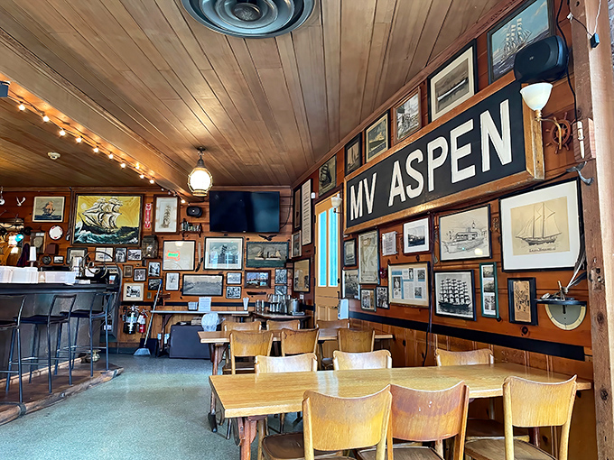Step inside and you're transported to a sailor's paradise. Wood-paneled walls adorned with maritime memorabilia create the perfect backdrop for seafood feasting.