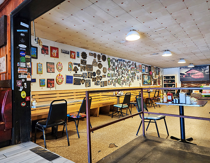 Wall-to-wall memories and memorabilia create the perfect backdrop for comfort food conversations. This isn't decoration&mdash;it's a community scrapbook.