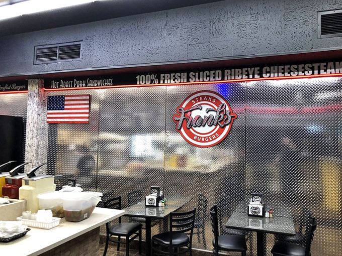 Inside Frank's, stainless steel meets American pride. No frills necessary when the food does all the talking.