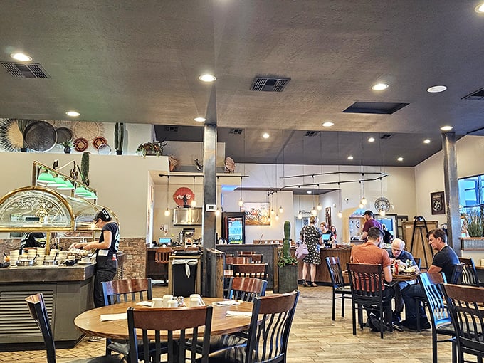 Inside, southwestern charm meets comfort dining. The warm wood tones and casual elegance say "stay awhile" – and trust me, you'll want to.