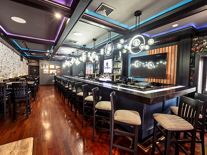 Modern meets comfort in this sleek interior where the blue-purple lighting suggests you've entered somewhere between a high-end restaurant and bacon heaven.