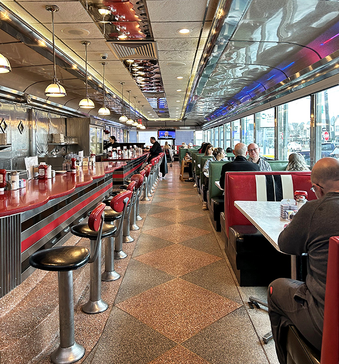 Classic Americana flows through every inch of the Mayfair's interior, where red vinyl booths and chrome accents transport you to a time when conversation trumped cell phones. 